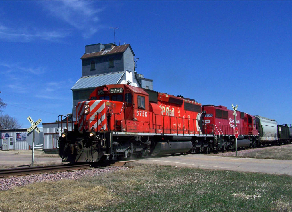CP 5750 passes the old elevator